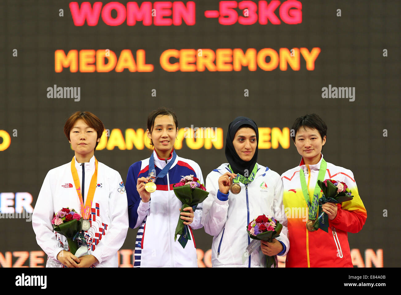 Incheon, South Korea. 30th Sep, 2014. Gold medalist Huang Yun Wen (2nd ...