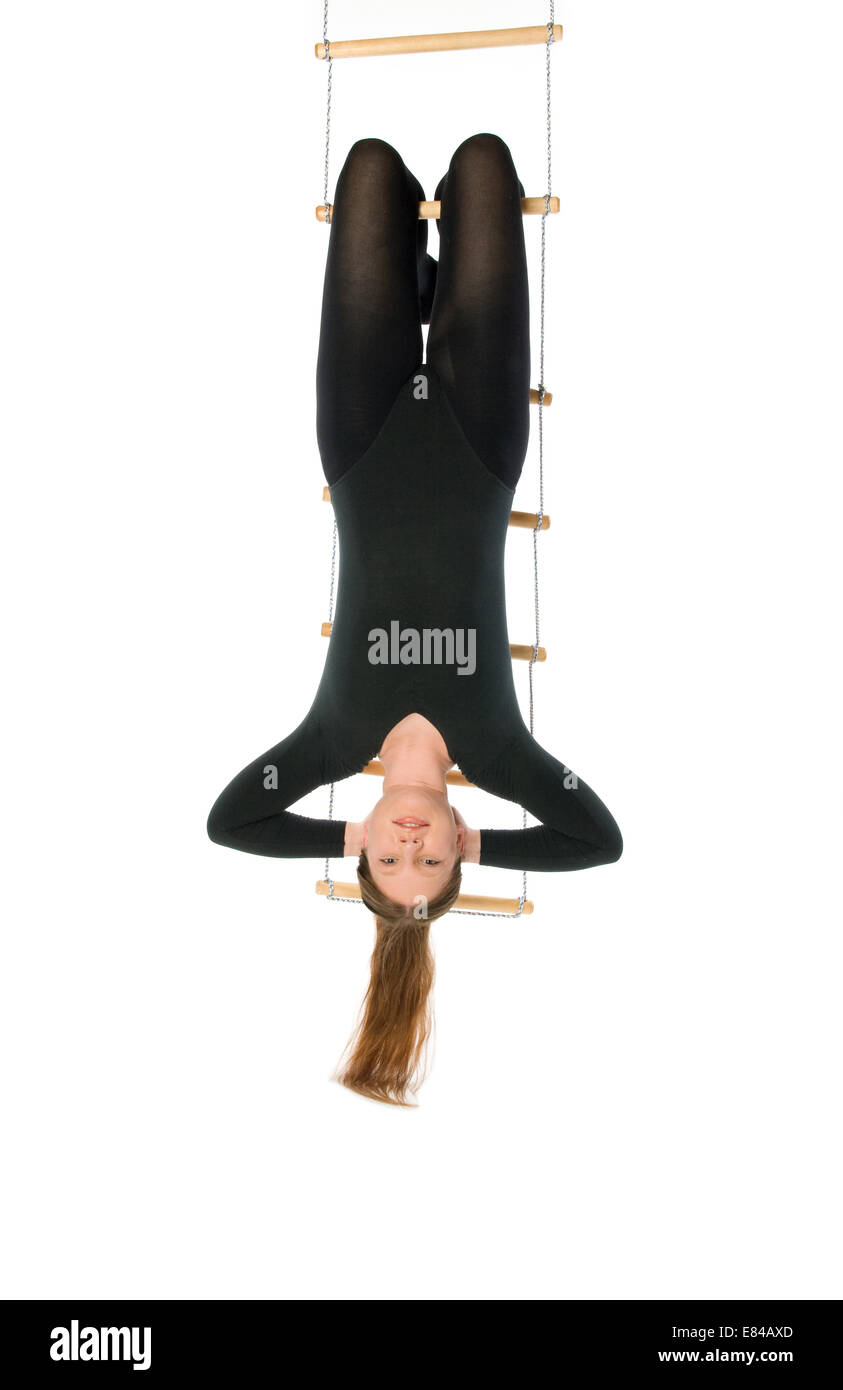 Woman hanging upside down on Cut Out Stock Images & Pictures - Alamy