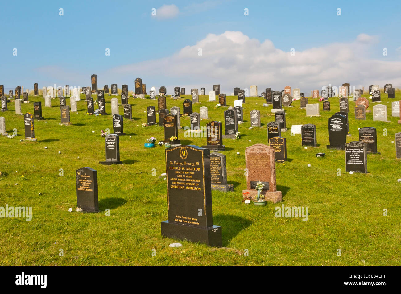 Headstones in a cemetery on the machair behind Luskentyre beach in ...