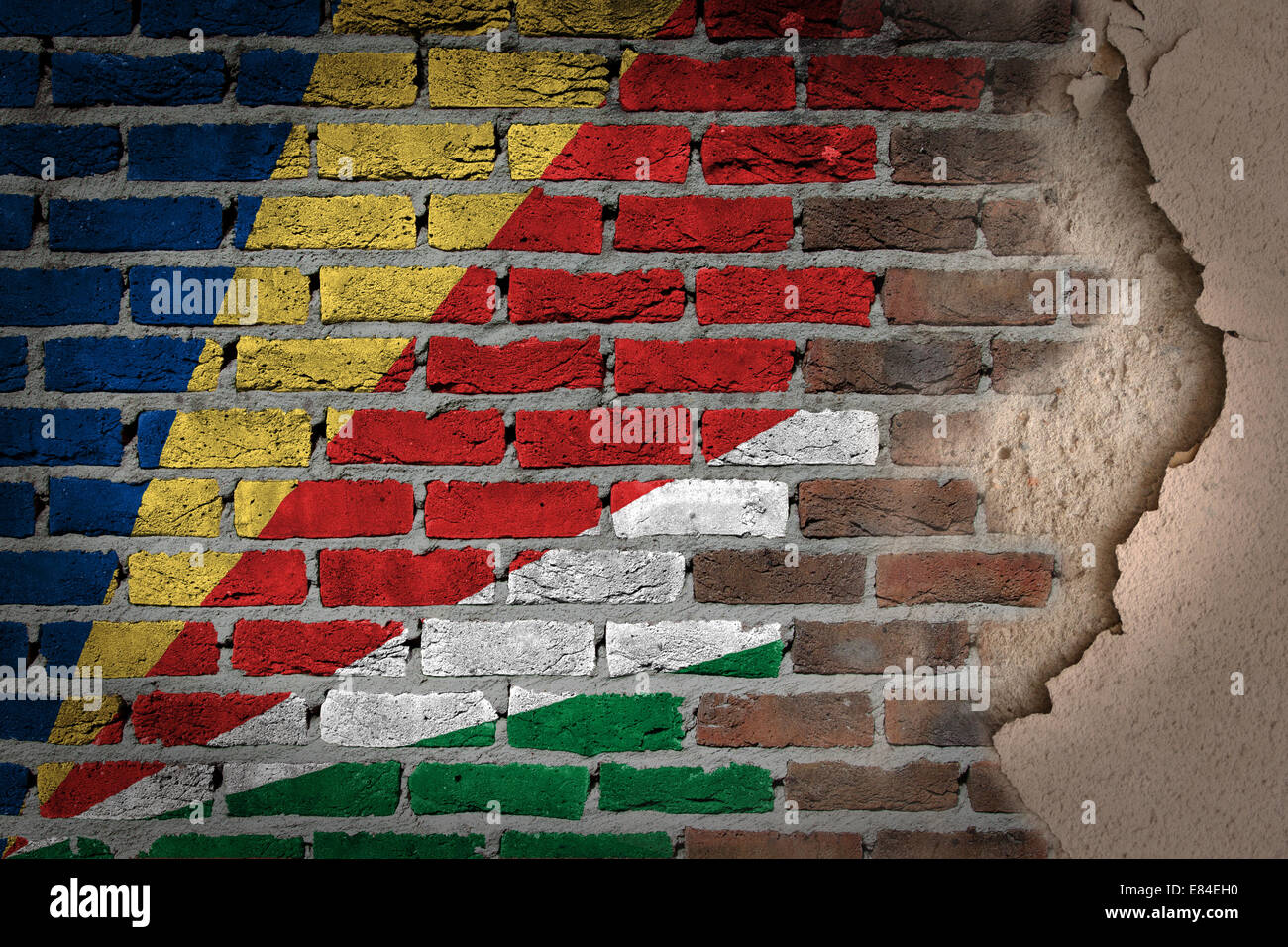 Dark brick wall texture with plaster - flag painted on wall ...