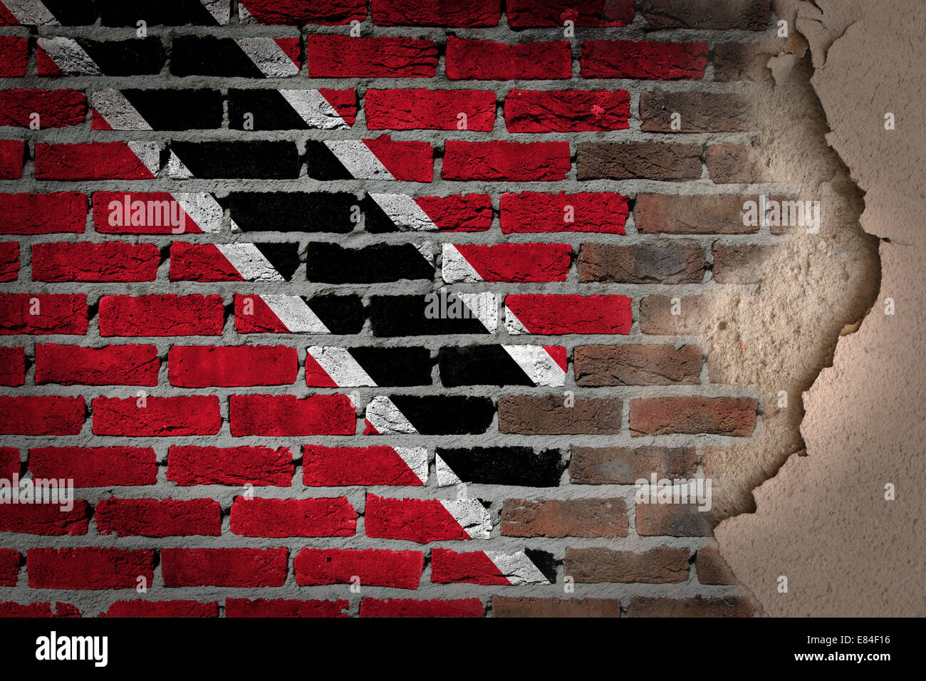 Dark brick wall texture with plaster - flag painted on wall - Trinidad ...