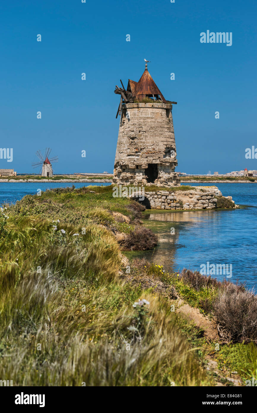 A broken windmill in a saline near Marsala, Paceco, Trapani, Sicily ...