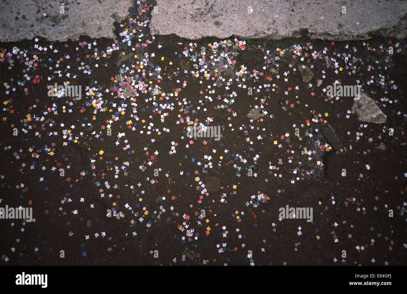 Carnival confetti on the ground Stock Photo - Alamy