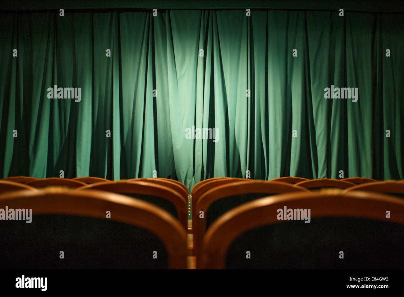 Theater stage green curtains Stock Photo - Alamy
