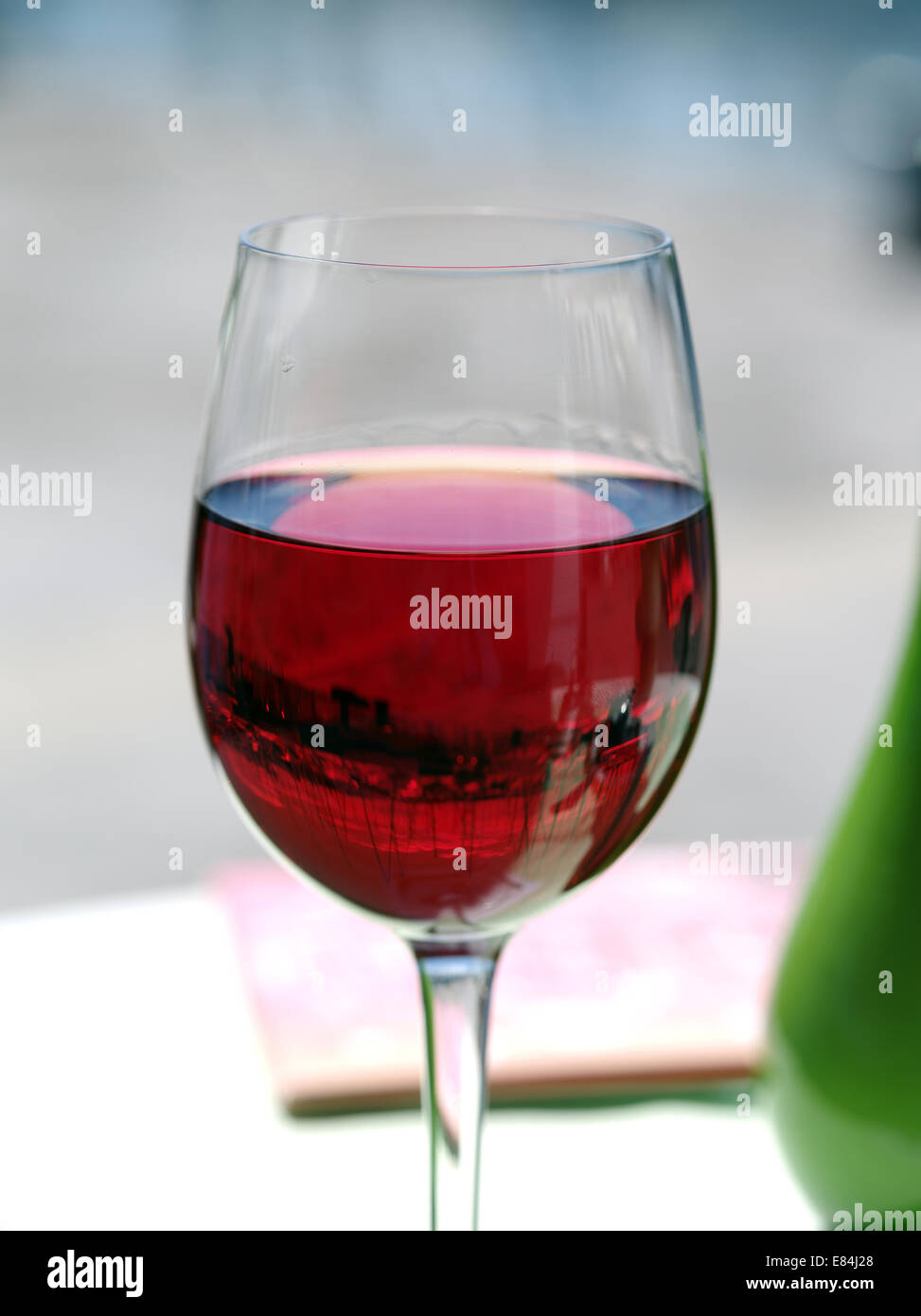 a glass of red wine in a bistro in the port town of Mogan on Gran ...