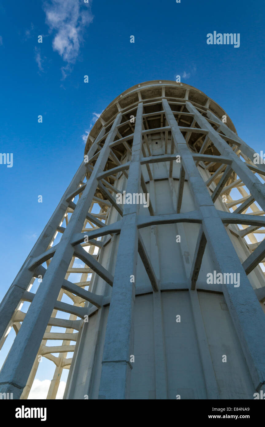 A white water tower against a blue sky Stock Photo - Alamy