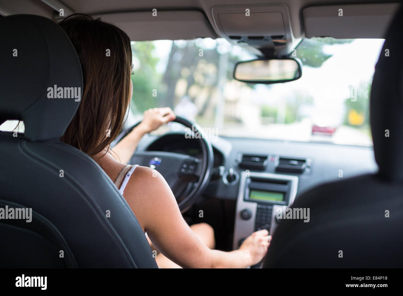 Driving a car from the back seat hi-res stock photography and images ...