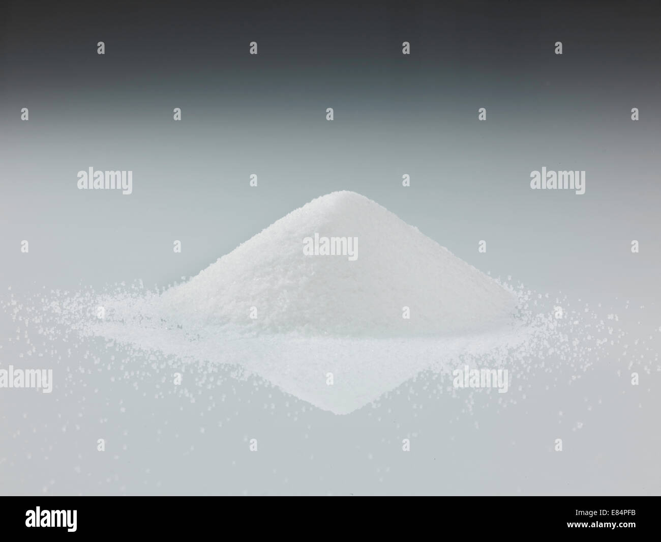 a pile of granulated sugar on a graduated neutral background Stock ...