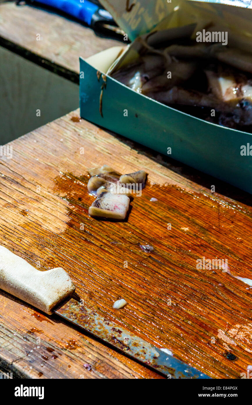 fish being cut up Stock Photo - Alamy