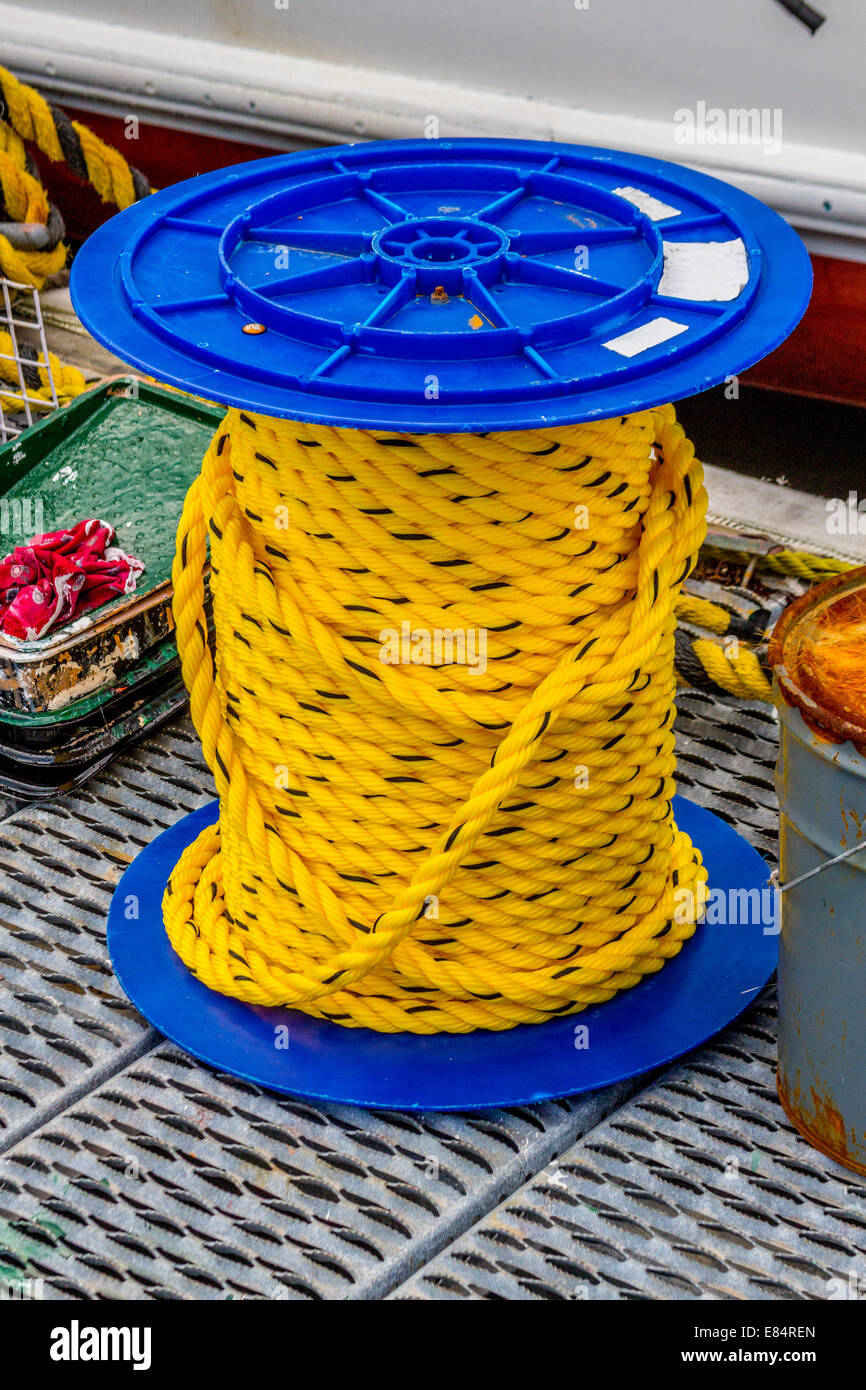 Colorful yellow rope on the dock Stock Photo - Alamy