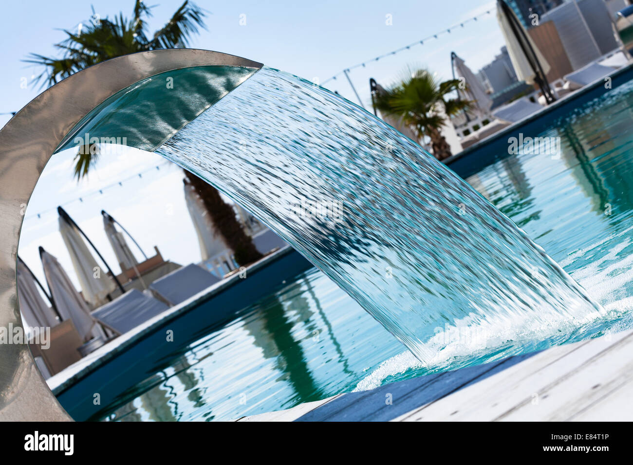 waterfall jet swimming pool Stock Photo - Alamy