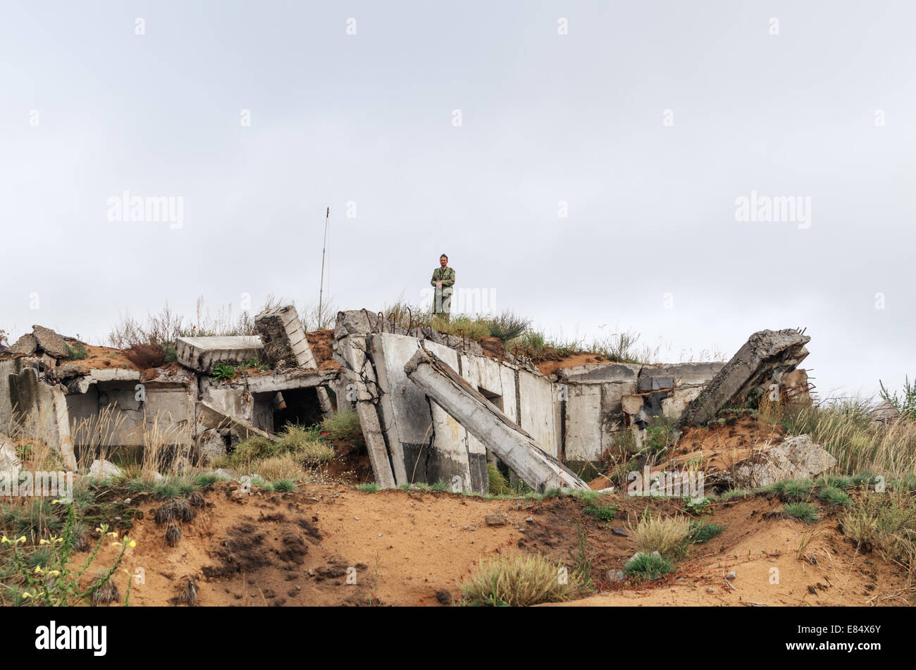 The destroyed military bunker on the former military ground Stock Photo ...