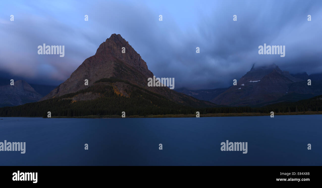 Dawn view from the Many Glacier Hotel at Swiftcurrent Lake in Glacier ...