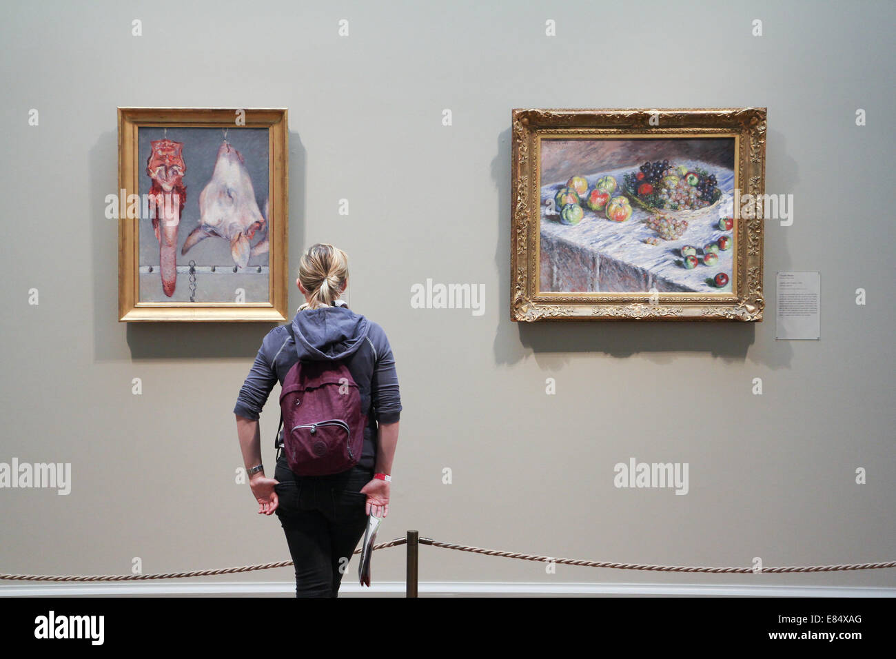 Woman looking paintings inside hi-res stock photography and images - Alamy