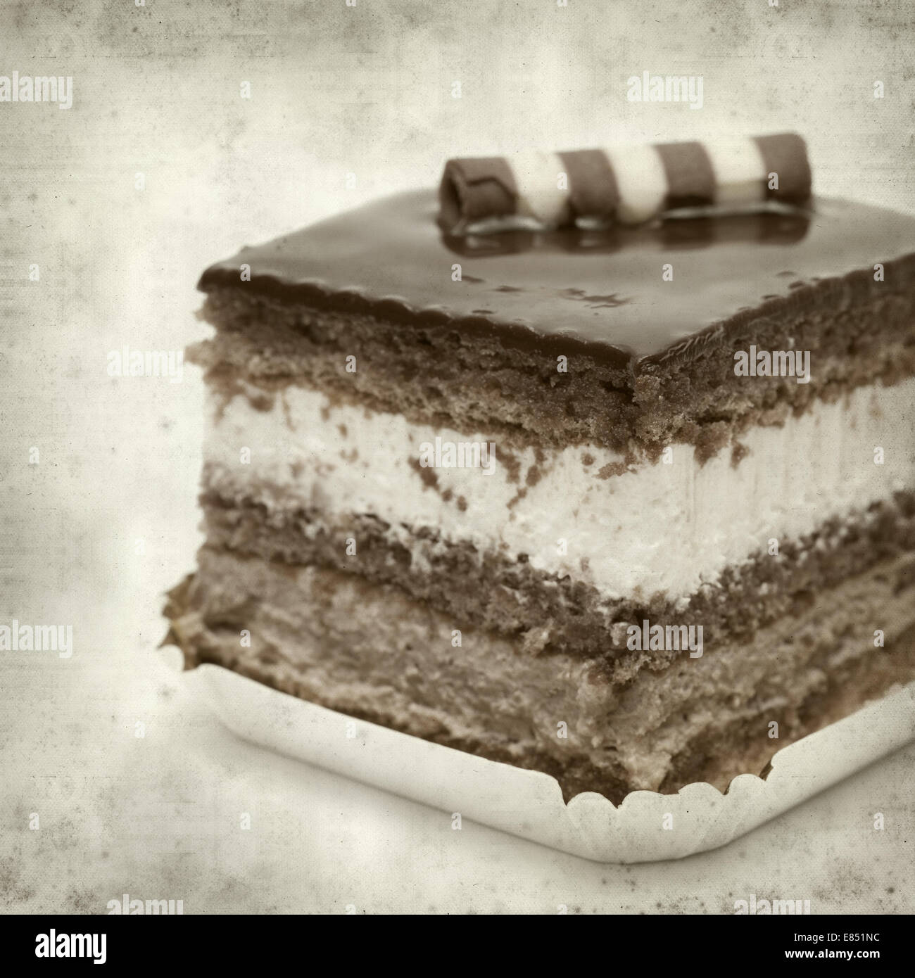 textured old paper background with layer chocolate cake Stock Photo - Alamy