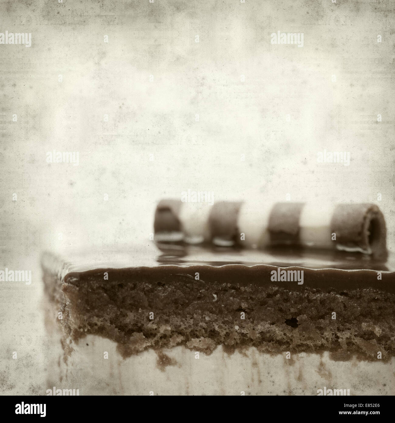 textured old paper background with layer chocolate cake Stock Photo - Alamy