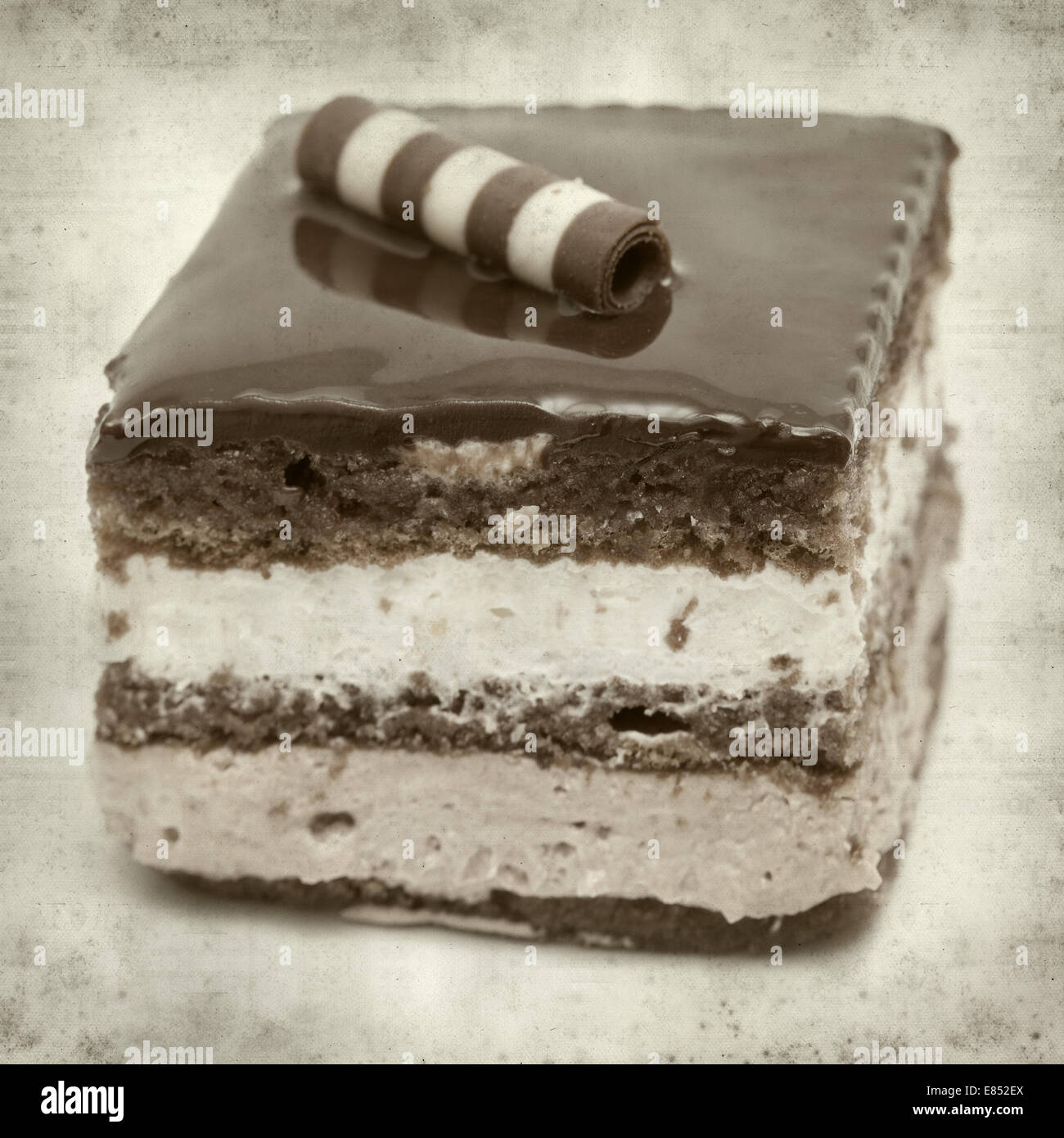 textured old paper background with layer chocolate cake Stock Photo - Alamy