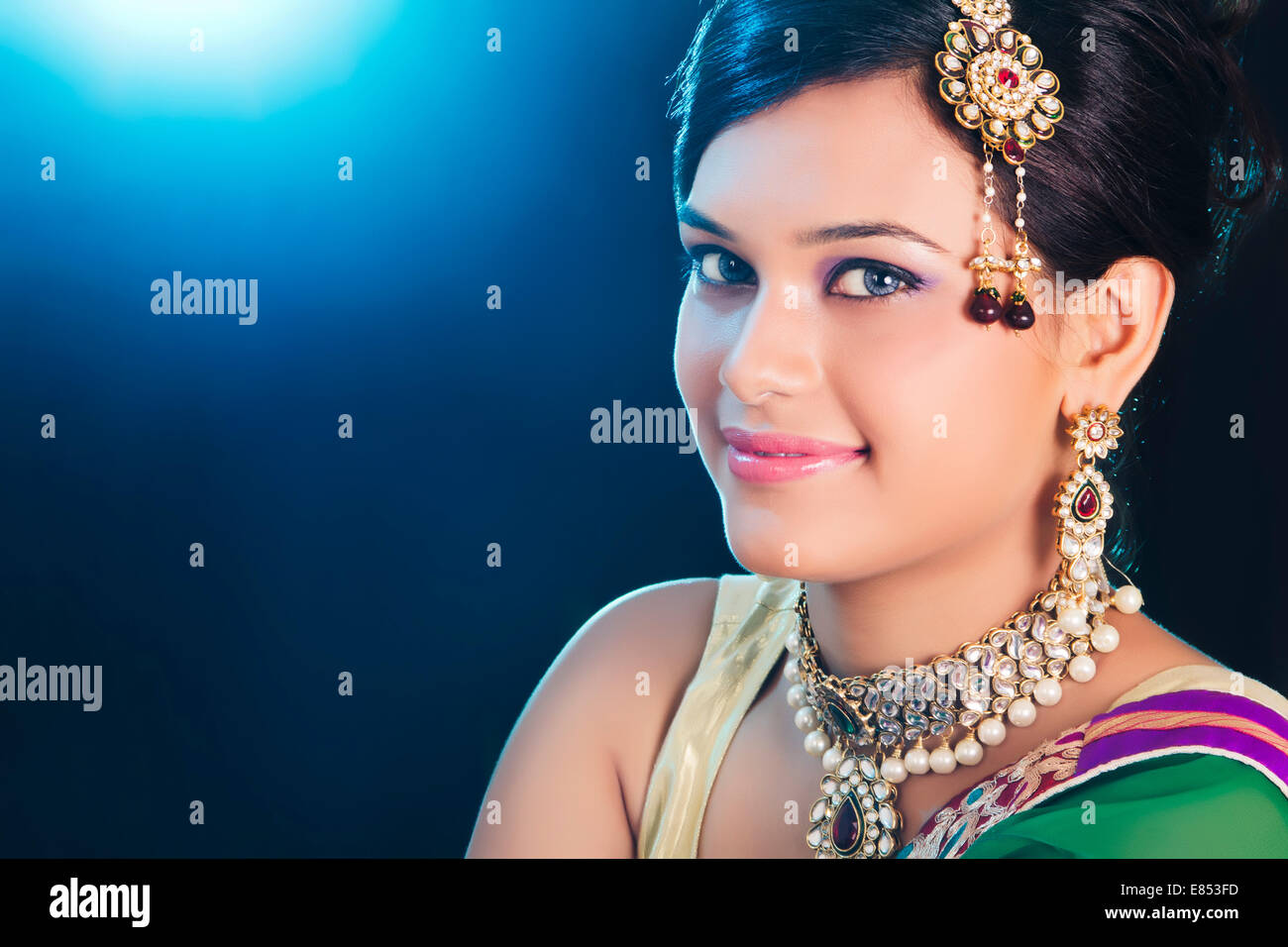 indian Glamor Ladies Designing Jewellery Stock Photo - Alamy