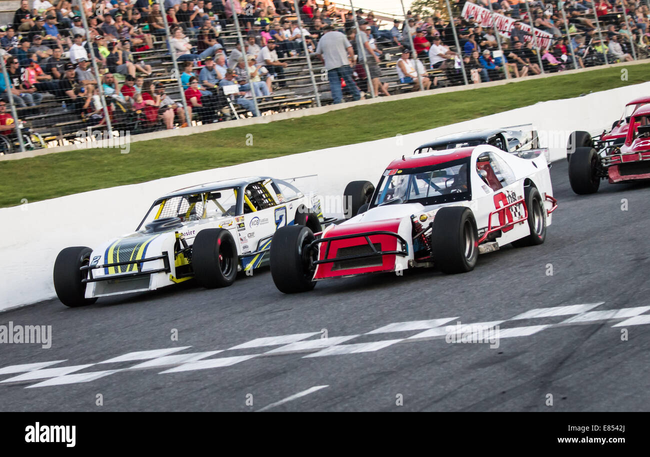 OSCAAR Modifieds crossing the start finish line after taking the green ...