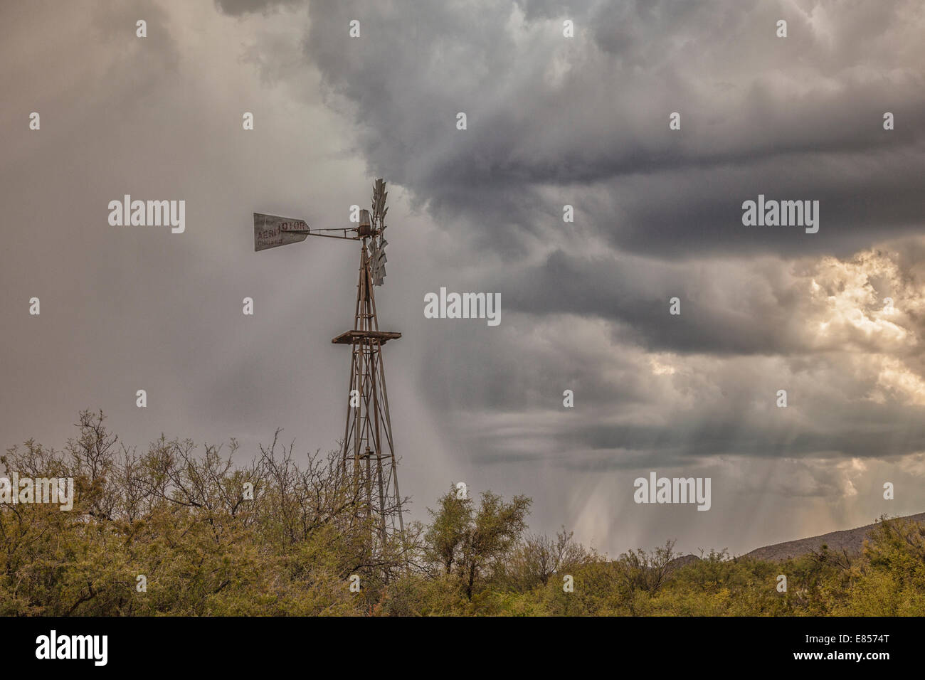 Windmill and sun rays in Big Bend National Park in West Texas Stock ...