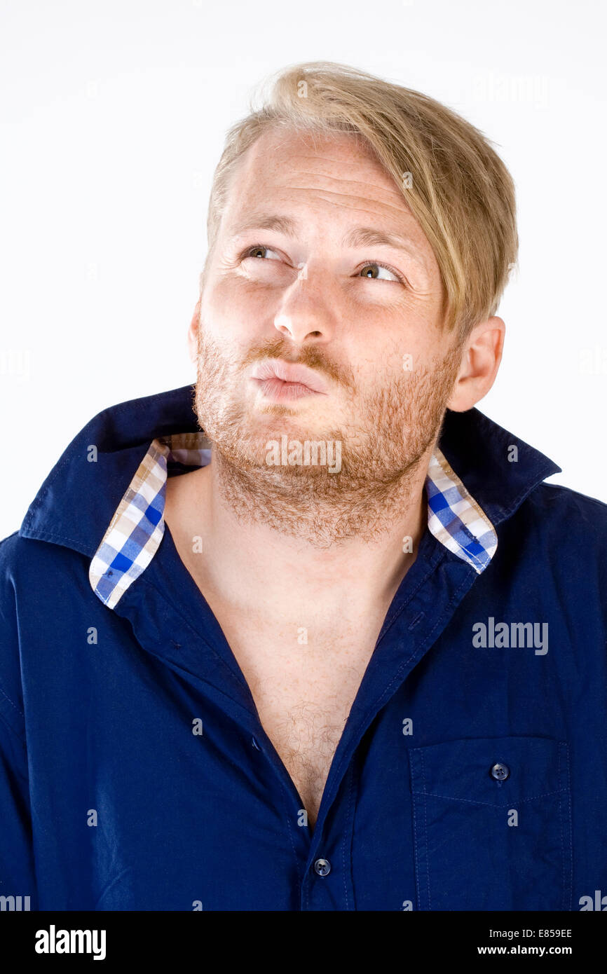 Thinking young man hi-res stock photography and images - Alamy
