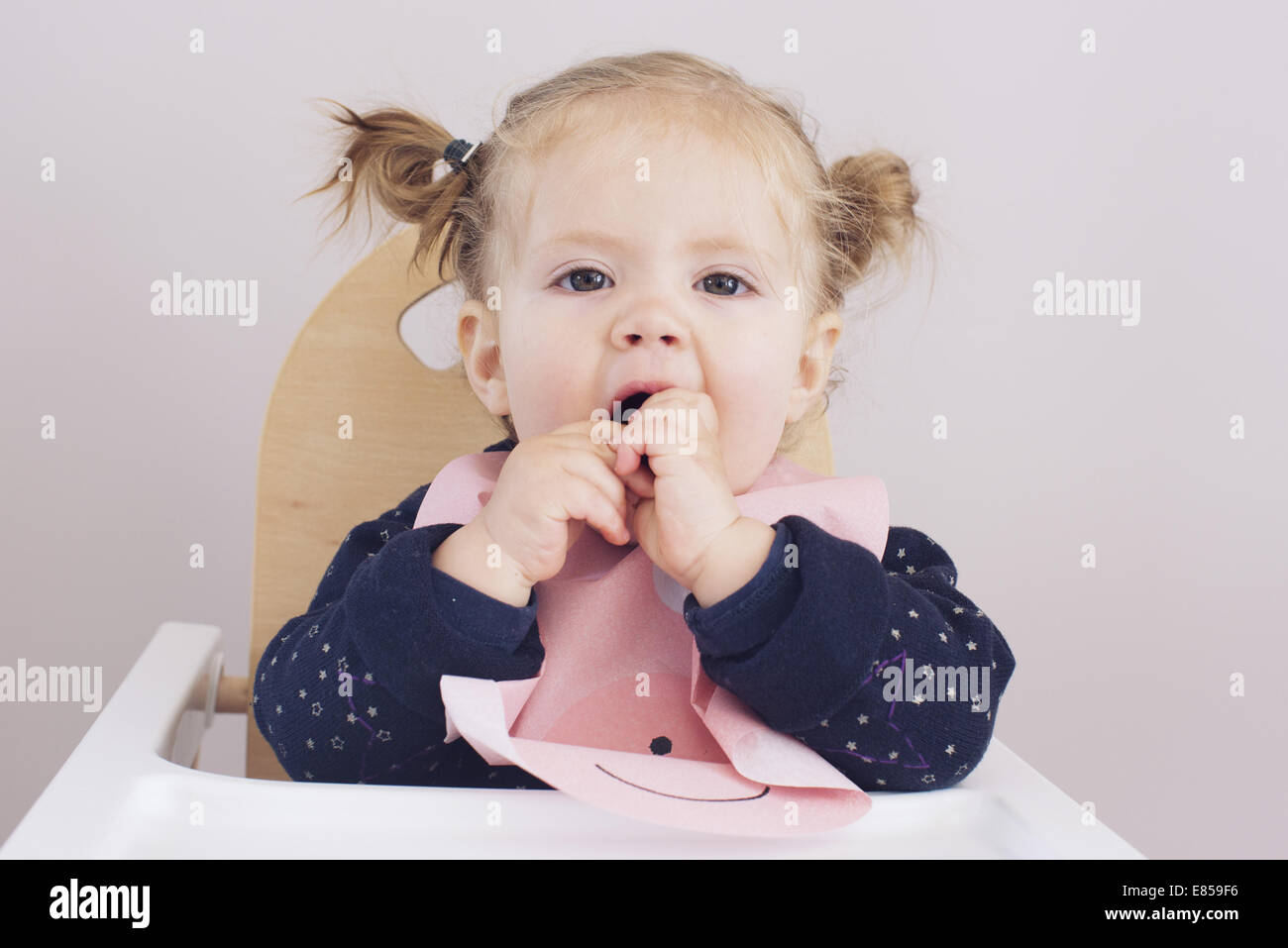 Baby eating finger foods in hi-res stock photography and images - Alamy