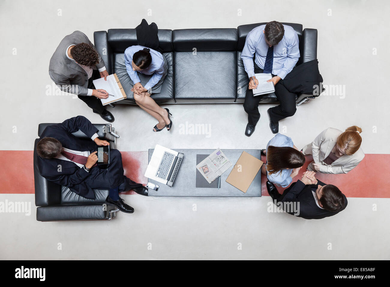 Executives in meeting, overhead view Stock Photo - Alamy