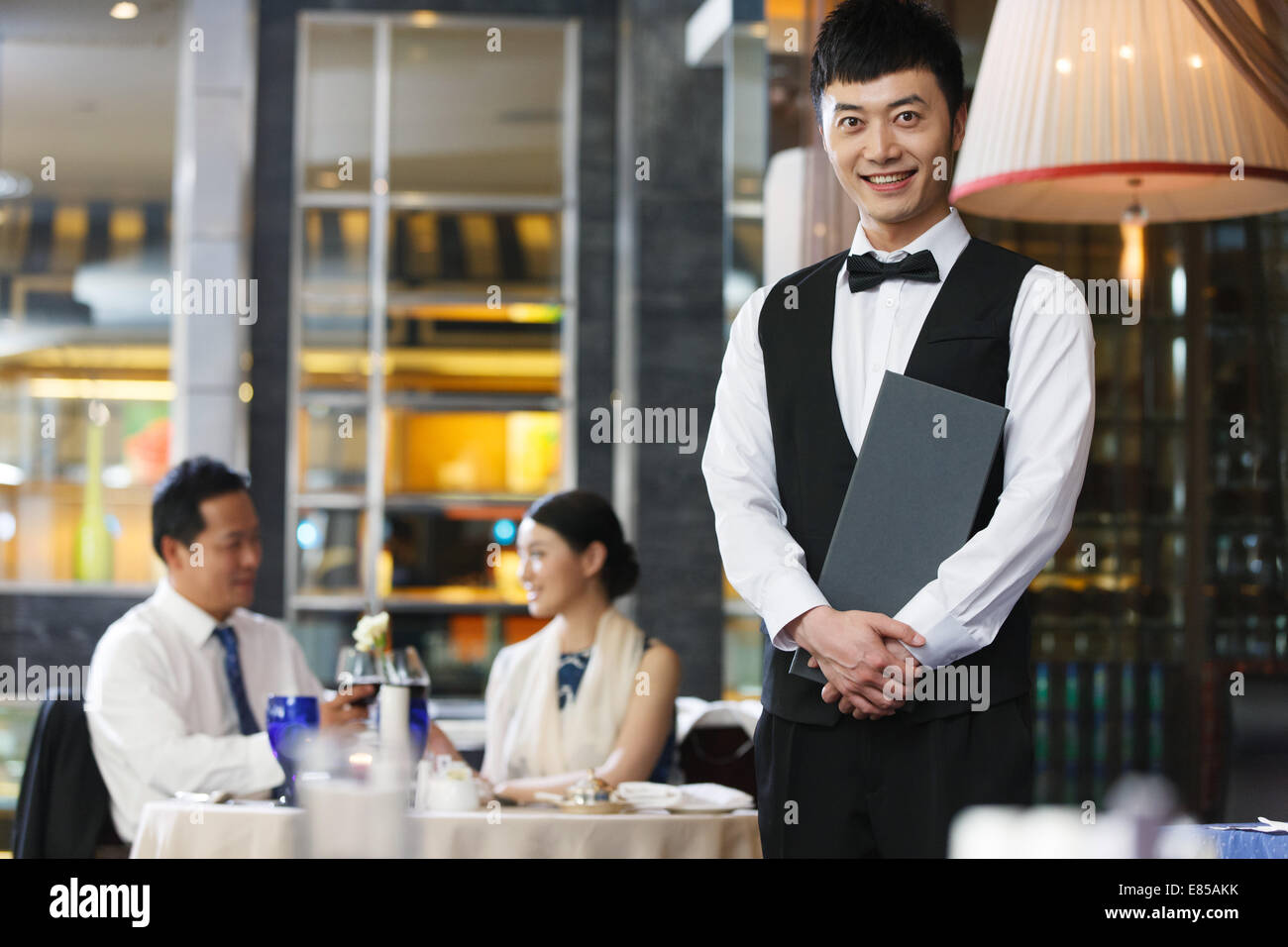 Portrait of hotel service staff Stock Photo - Alamy
