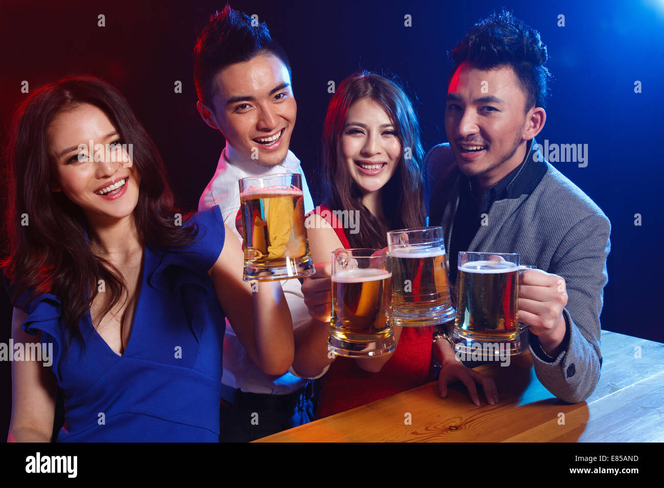 Young people at bar Stock Photo - Alamy
