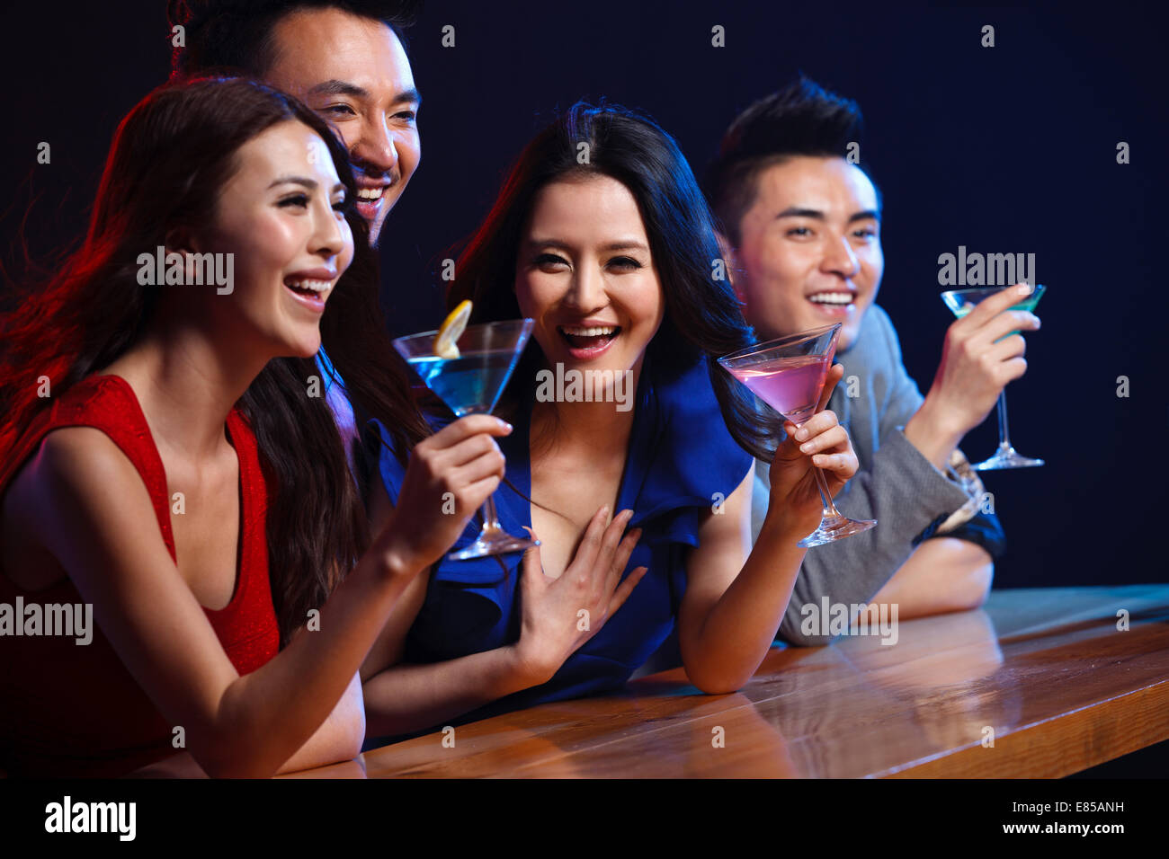 Young people at bar Stock Photo - Alamy