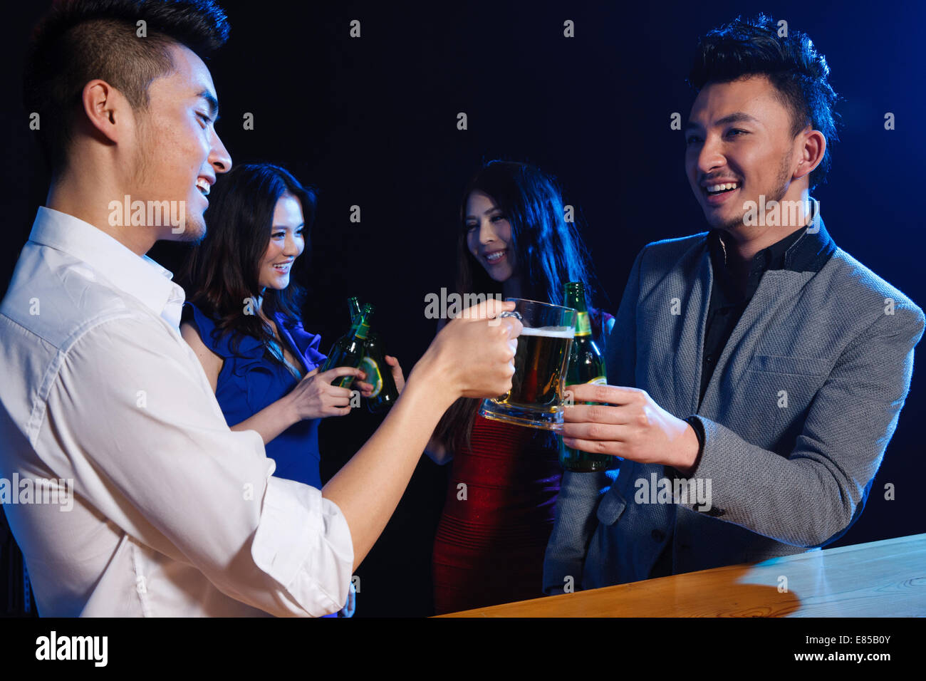 Young people at bar Stock Photo - Alamy