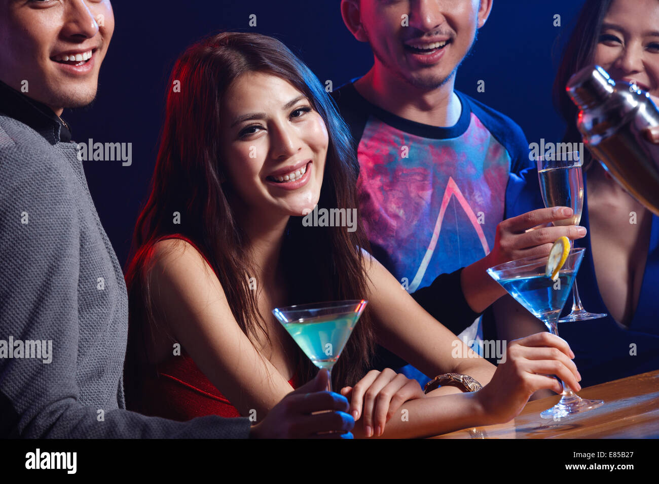 Young people at bar Stock Photo - Alamy