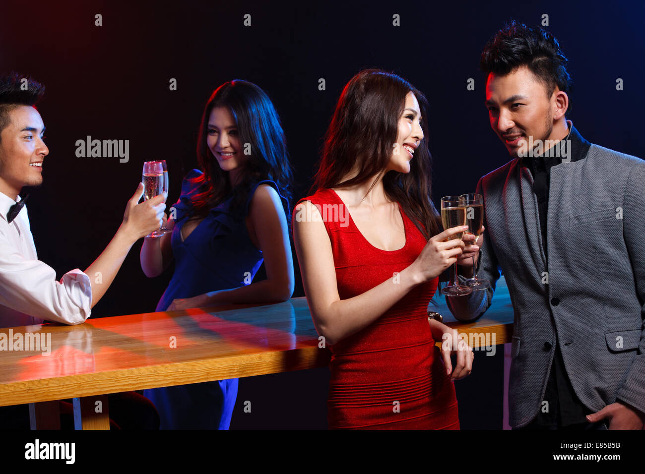 Young people at bar Stock Photo - Alamy