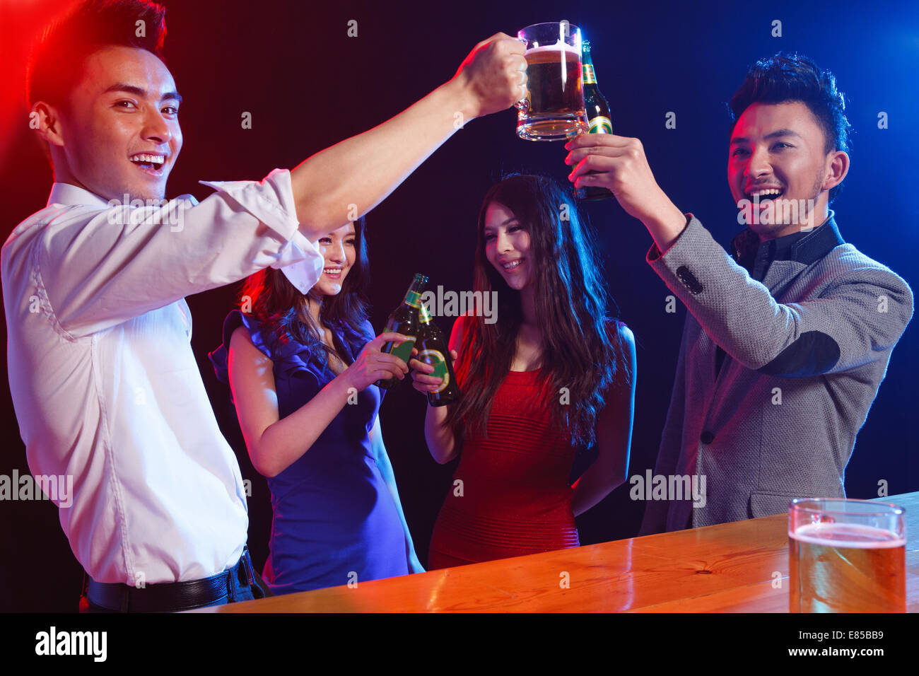 Young people at bar Stock Photo - Alamy