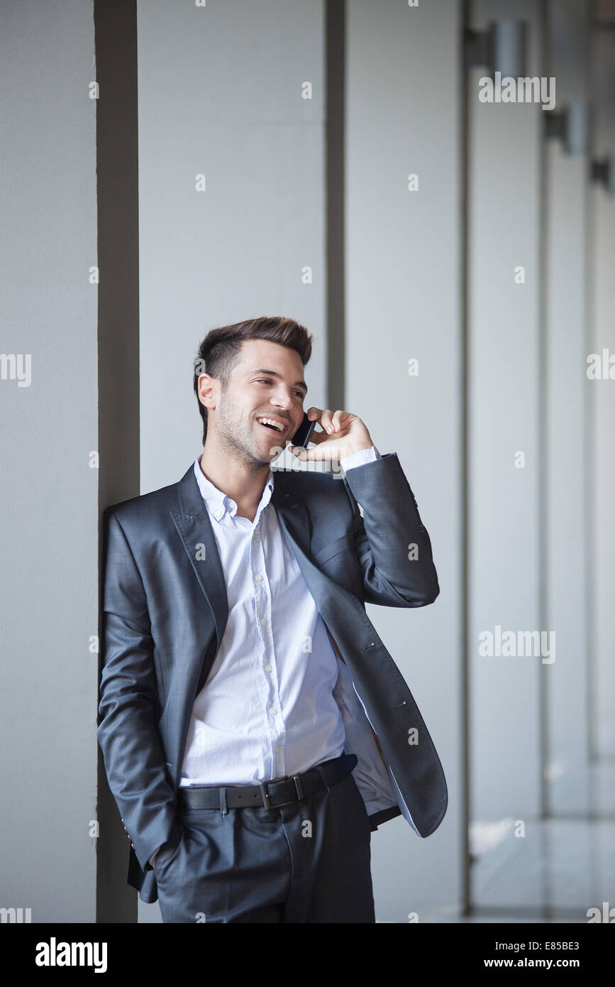 Young man leaning on column hi-res stock photography and images - Alamy