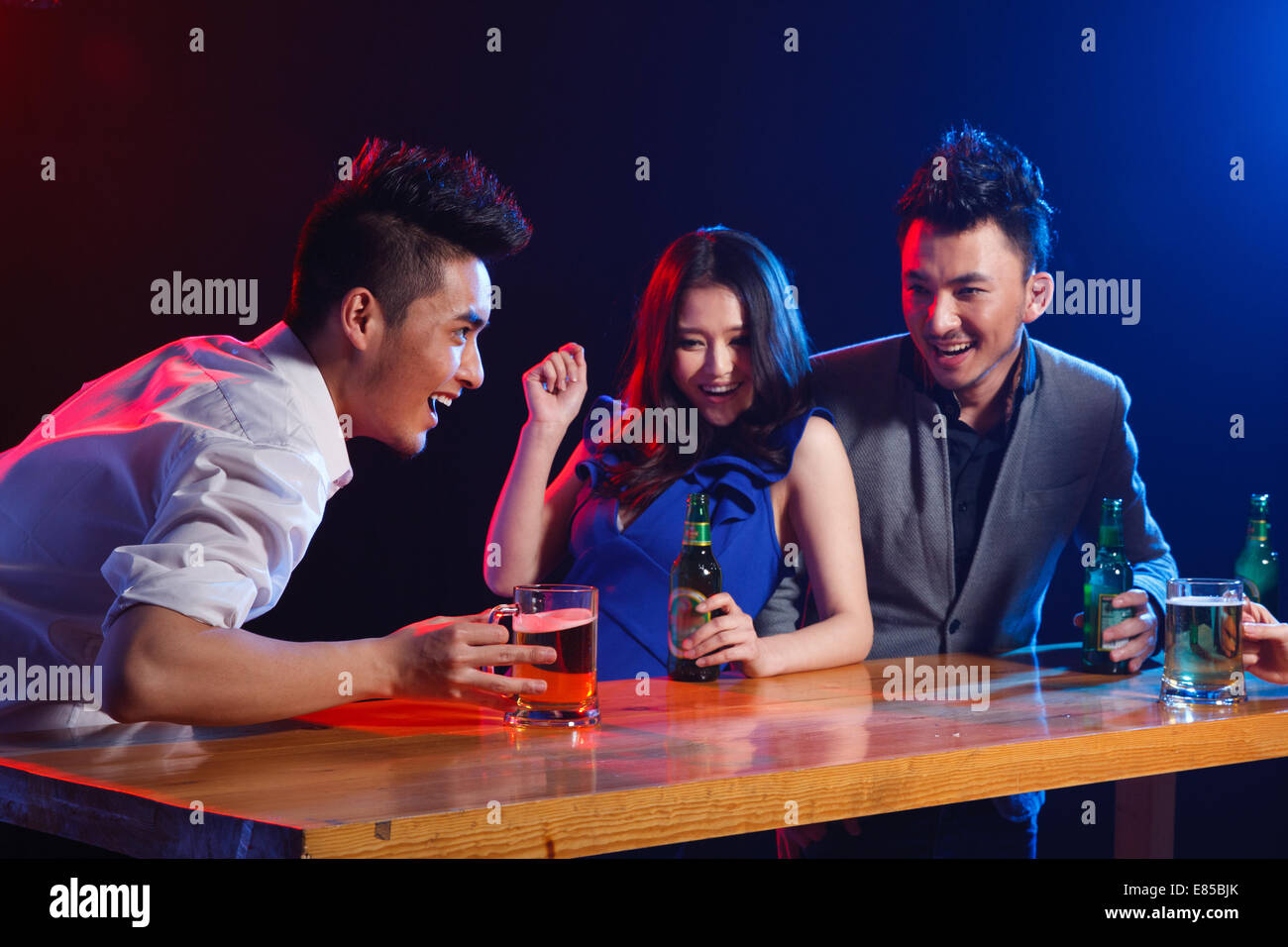 Young people at bar Stock Photo - Alamy