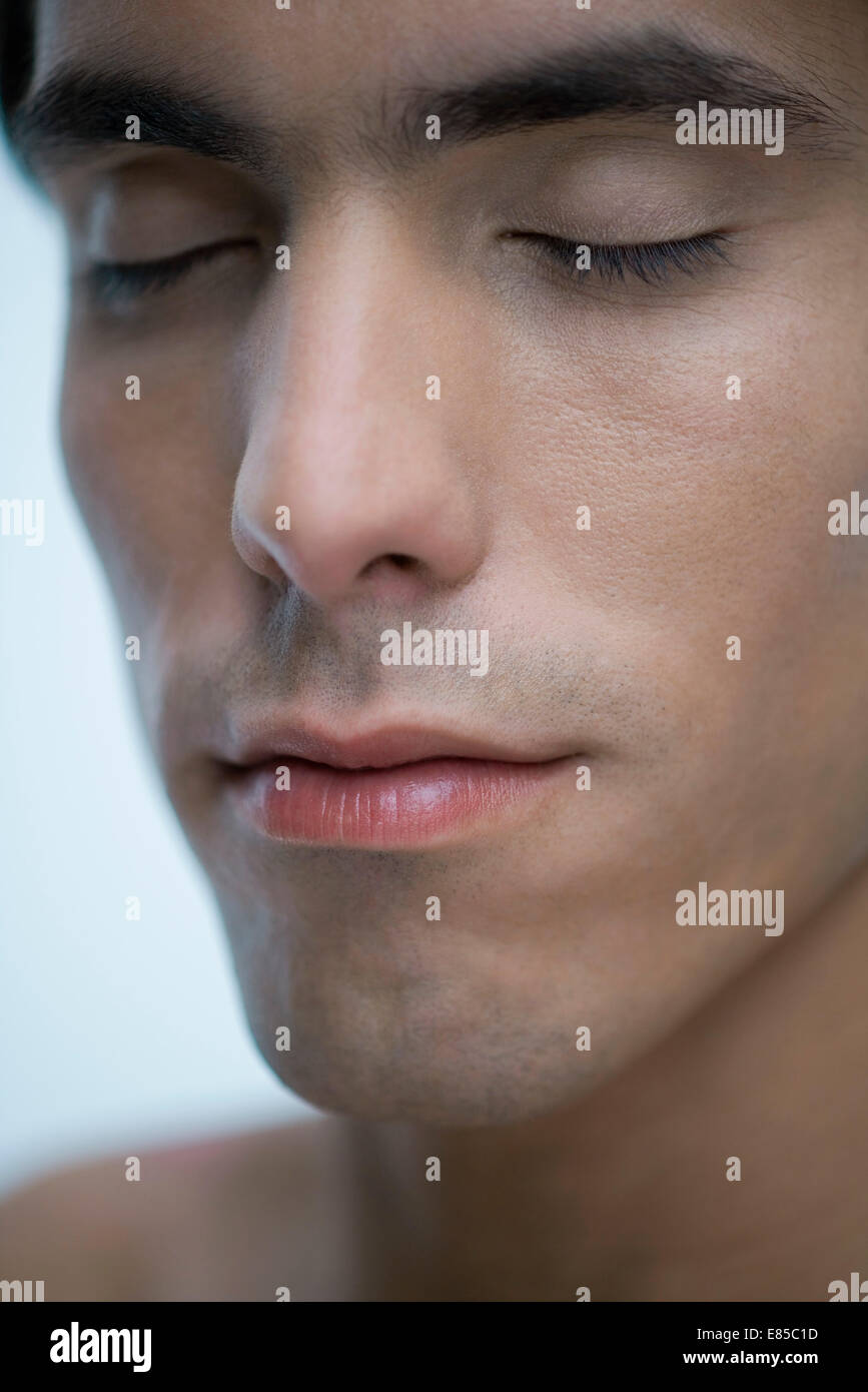 Man with eyes closed, close-up Stock Photo - Alamy