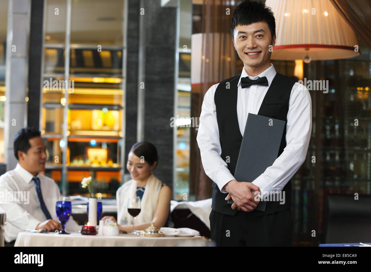 Restaurant service staff Stock Photo - Alamy