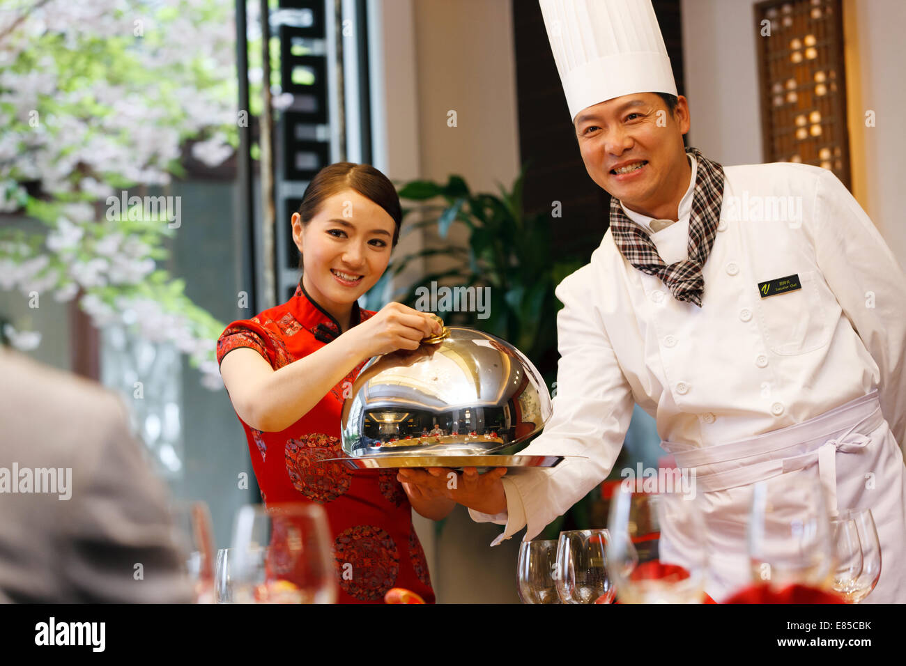 Chef with customer Stock Photo - Alamy