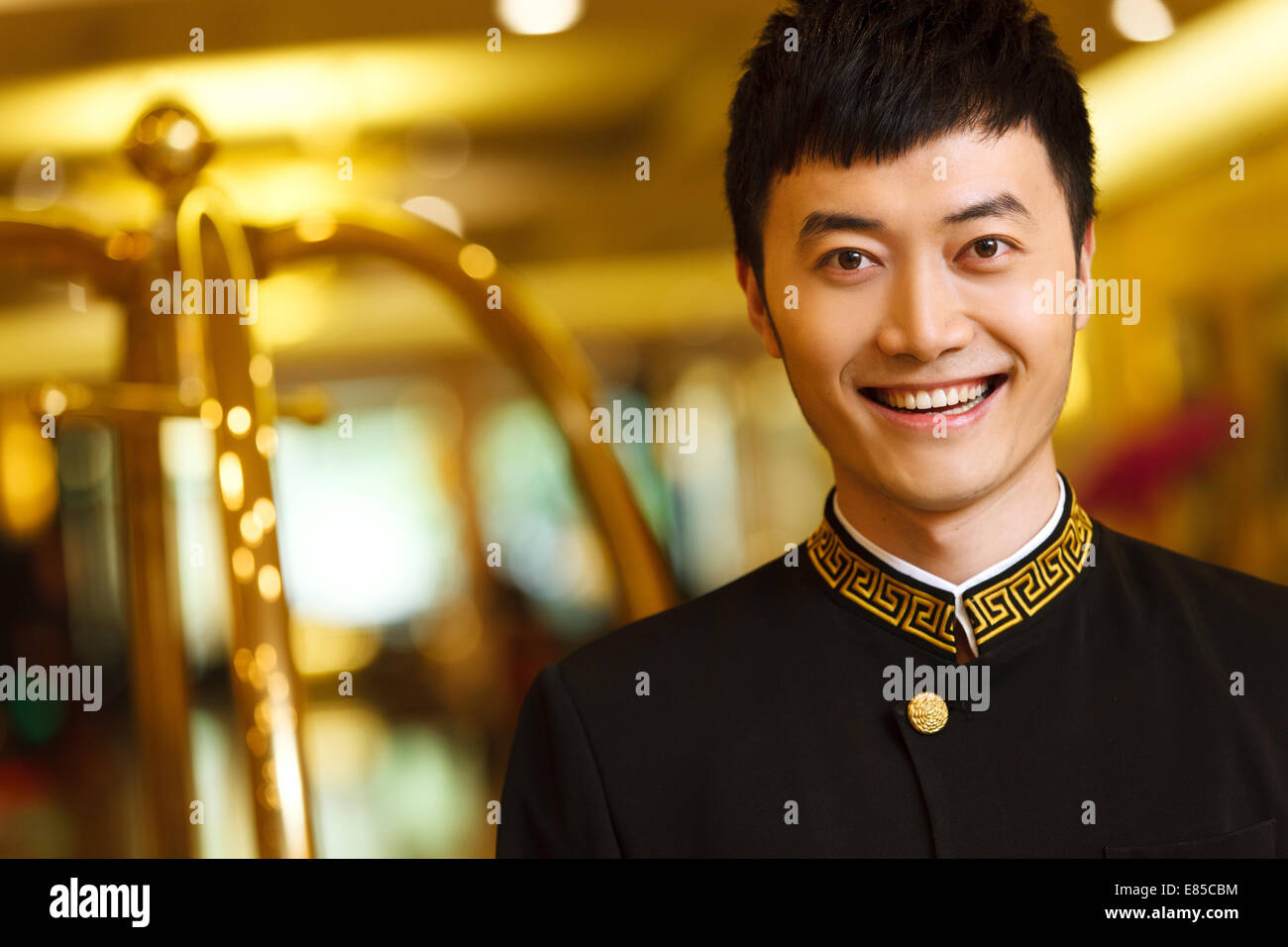 Portrait of hotel service staff Stock Photo - Alamy