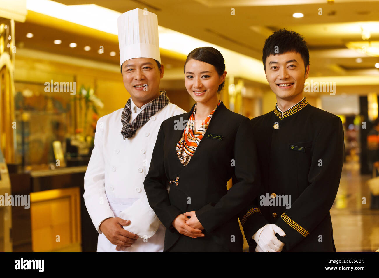 Portrait of hotel service staff Stock Photo - Alamy
