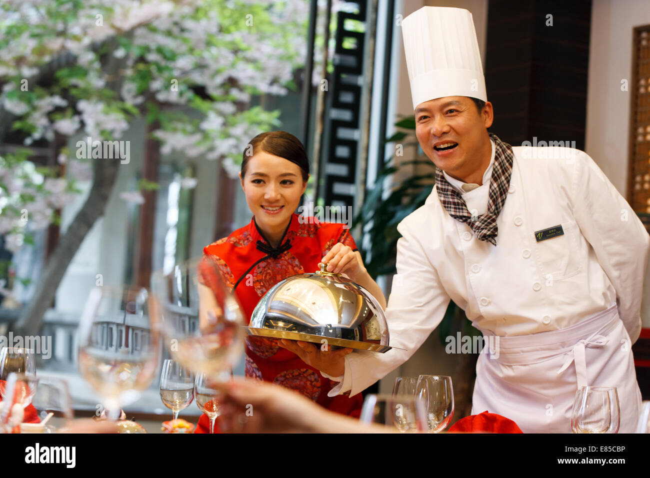 Chef with customer Stock Photo - Alamy