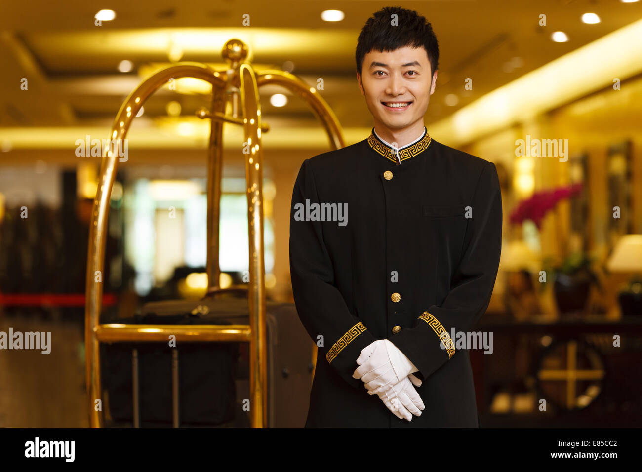 Portrait of hotel service staff Stock Photo - Alamy