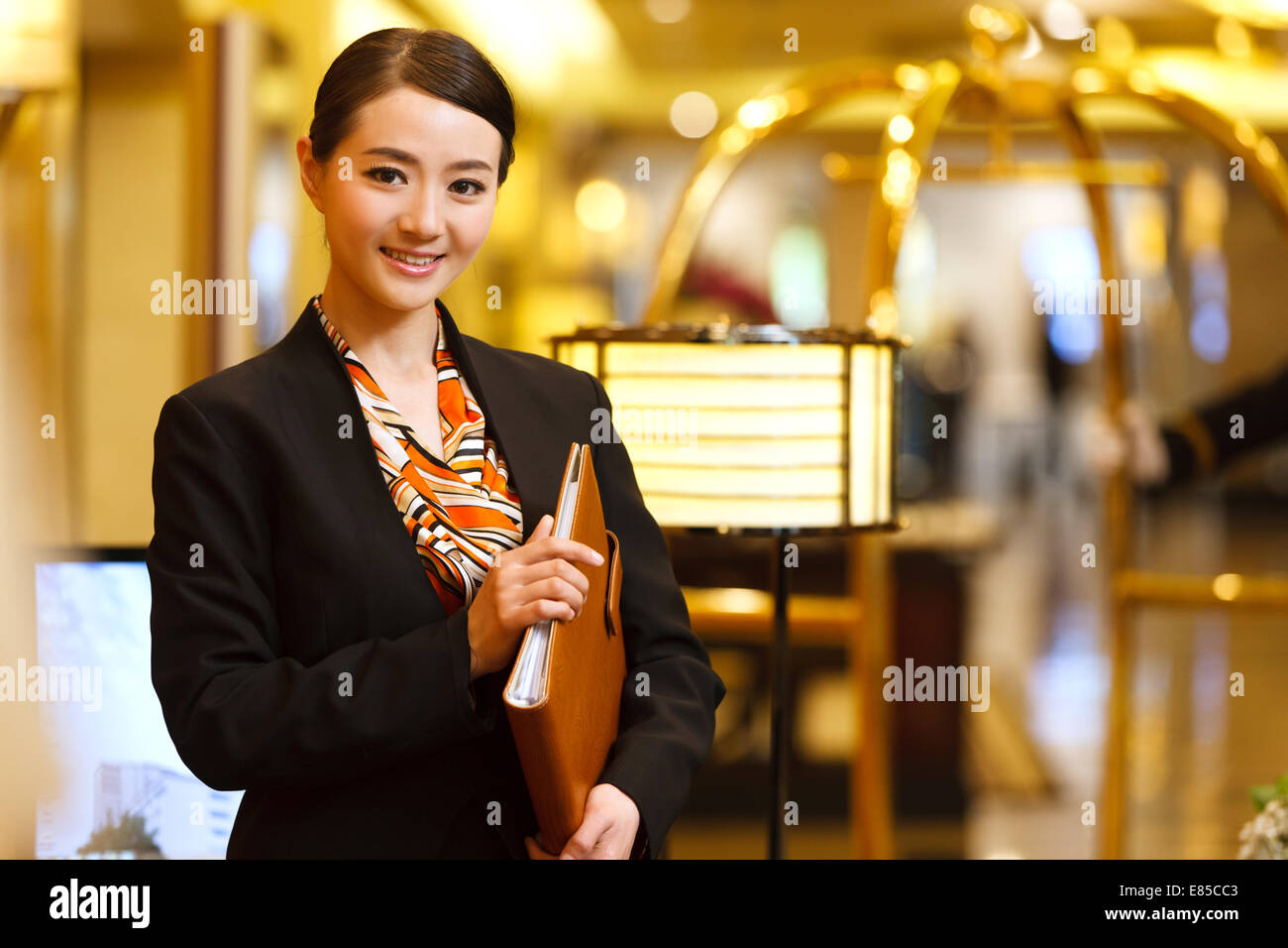 Portrait of hotel service staff Stock Photo - Alamy