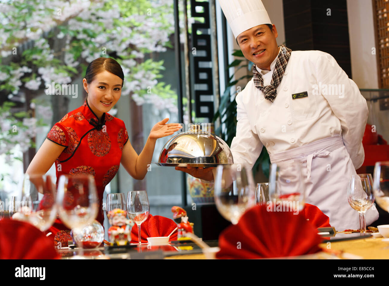 Chef with customer Stock Photo - Alamy