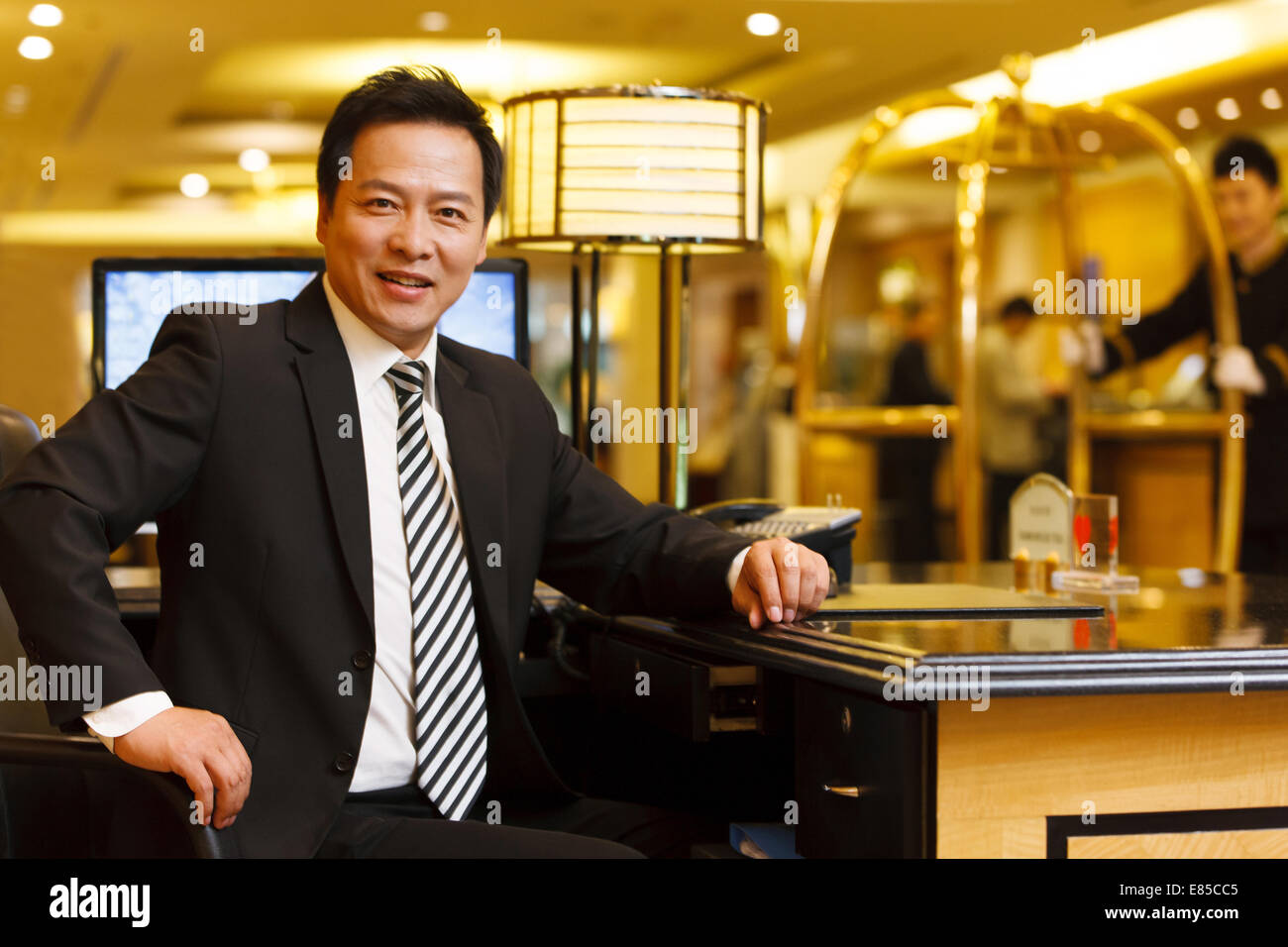 Portrait of hotel service staff Stock Photo - Alamy