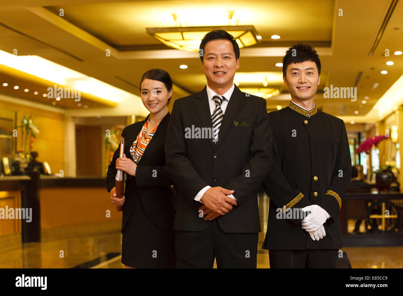 Portrait of hotel service staff Stock Photo - Alamy