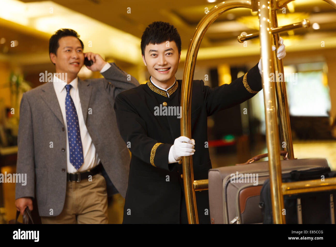 Portrait of hotel service staff Stock Photo - Alamy
