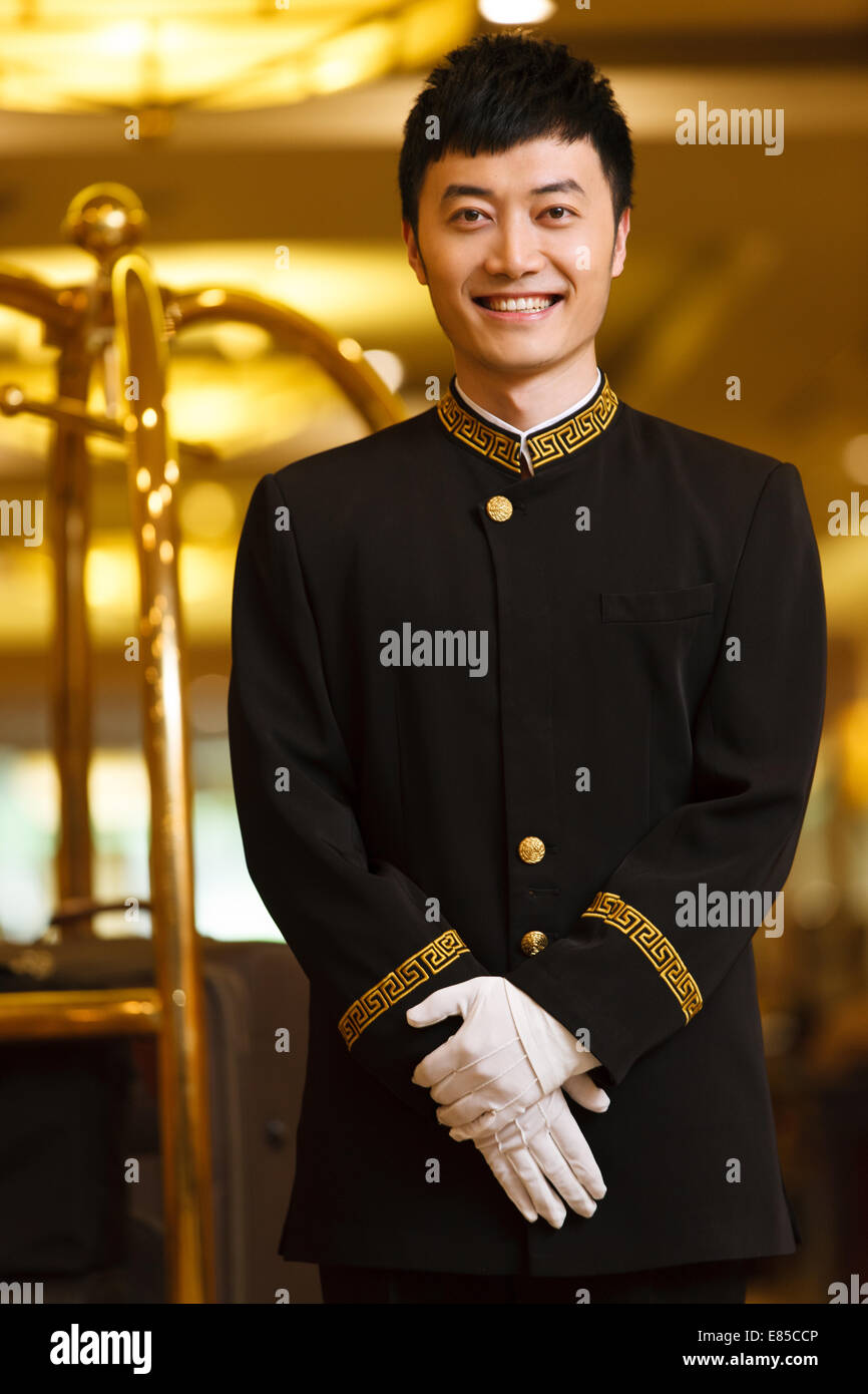 Portrait of hotel service staff Stock Photo - Alamy