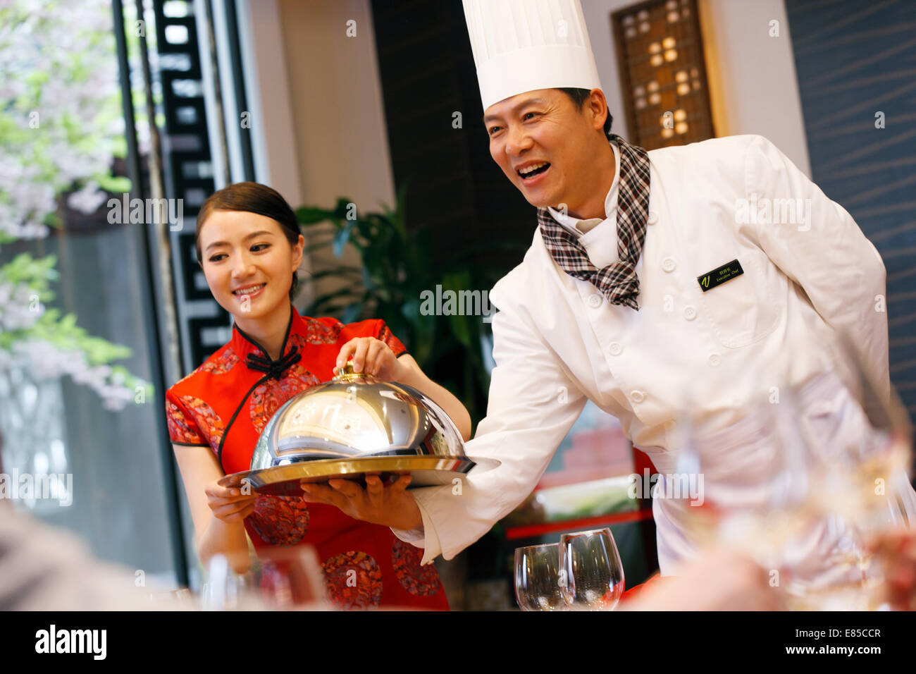 Chef with customer Stock Photo - Alamy